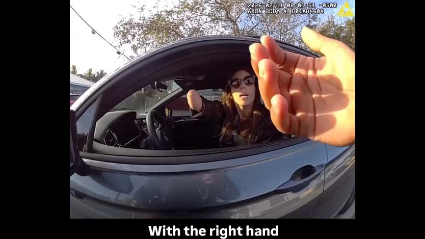 Amazing Body Cam Footage Of A Woman Pulled Over For Having Her Phone In ...